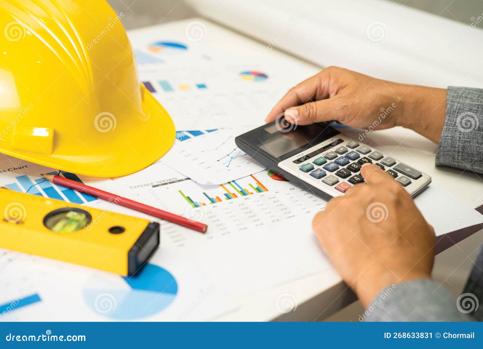 Asian Engineer with Architectural House Plan Project Blueprint, Graph ...