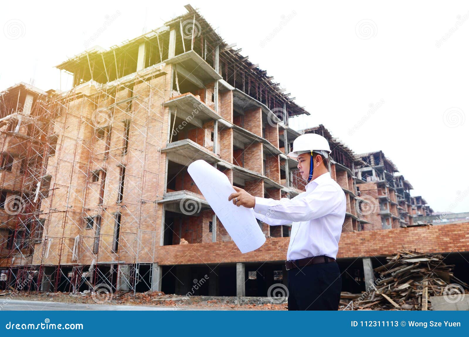 Asian Engineer at the Building Construction Site Stock Image - Image of ...