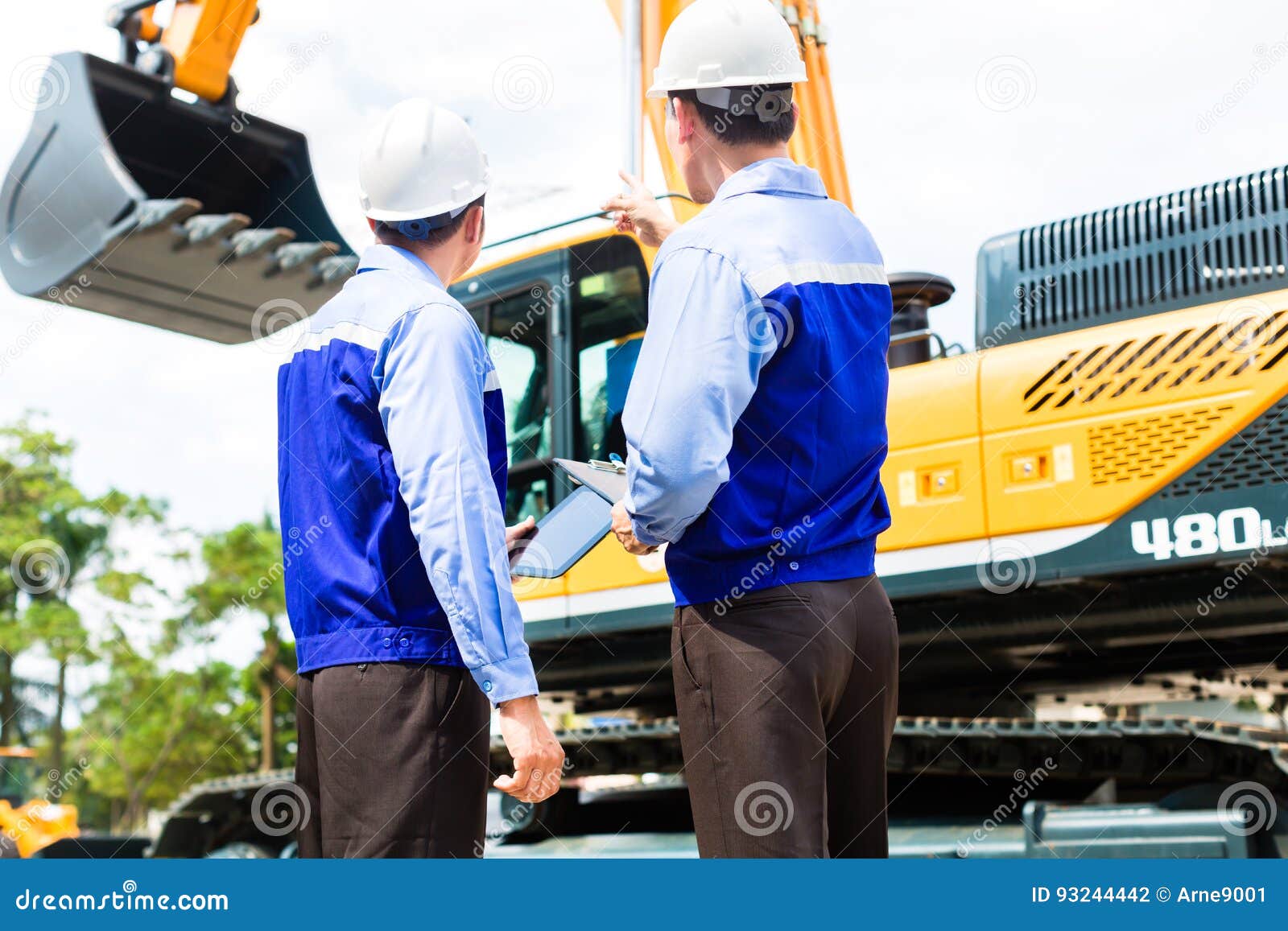 Engineer And Construction Workers On The Tall Buildings, On The ...