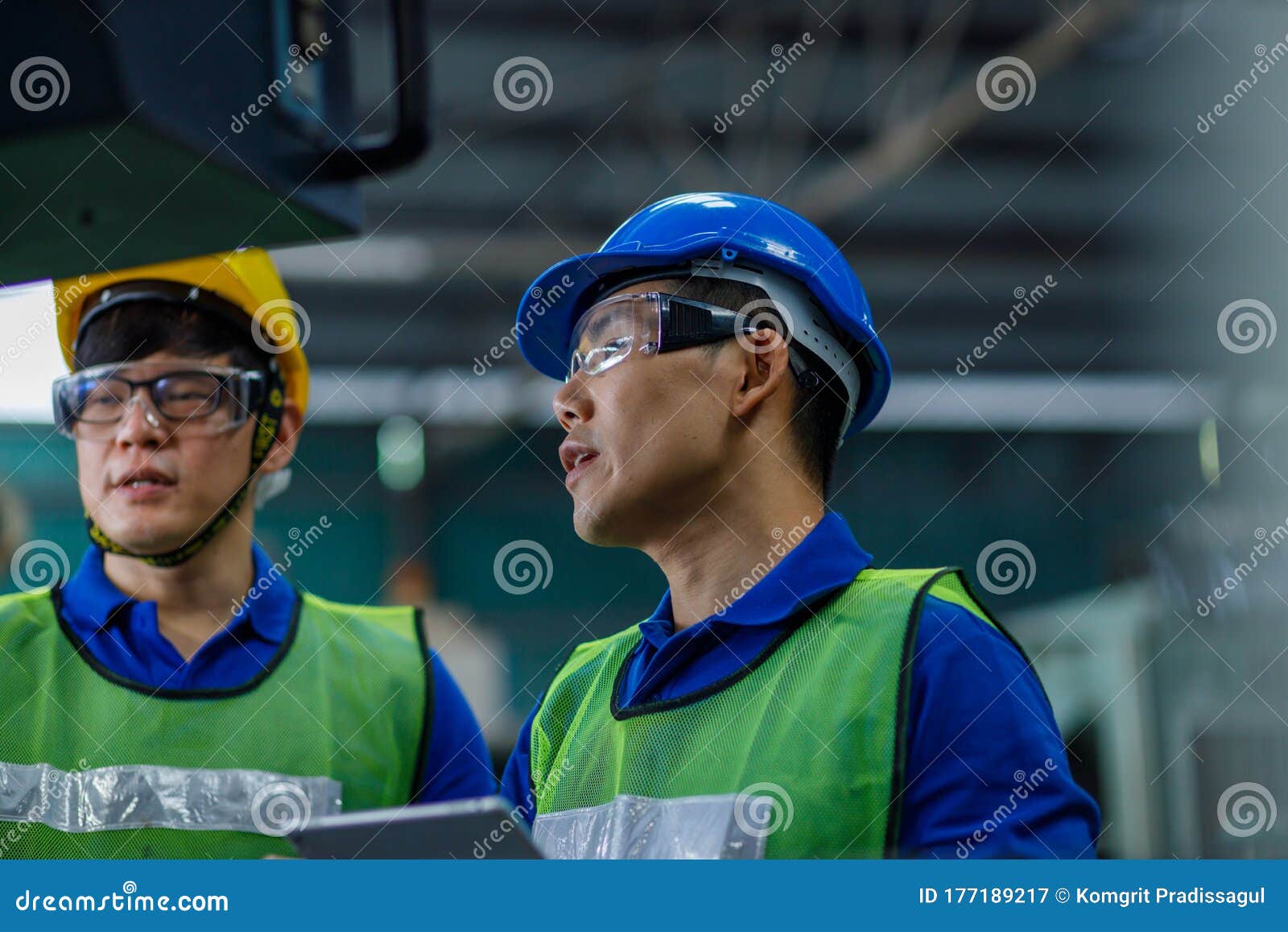 Asian Engineer and Staff or Industrial Worker Talking Stock Image ...
