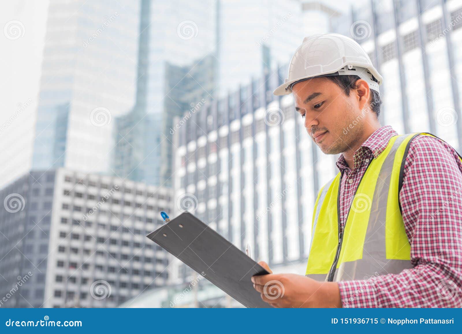 Asian Civil Engineer Working at Building Site. Stock Image - Image of ...