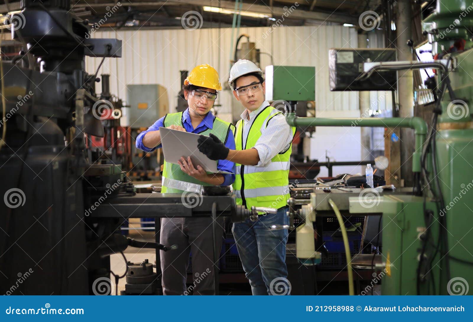 Asian Engineering Manager and Mechanic Worker in Safety Hard Hat and ...
