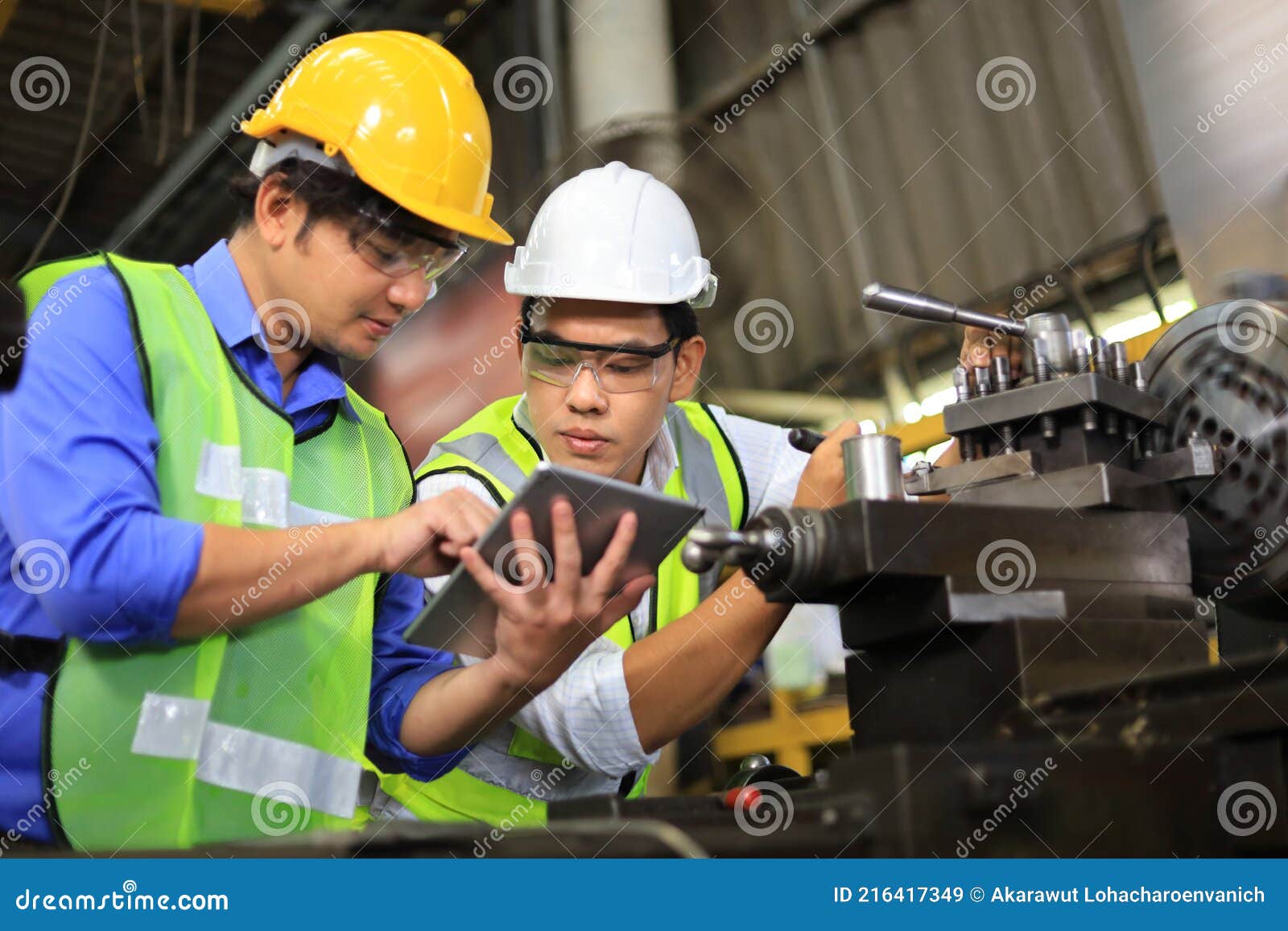Men Are Using A Lathe To Make Thread From The Steel Shaft Royalty-Free ...