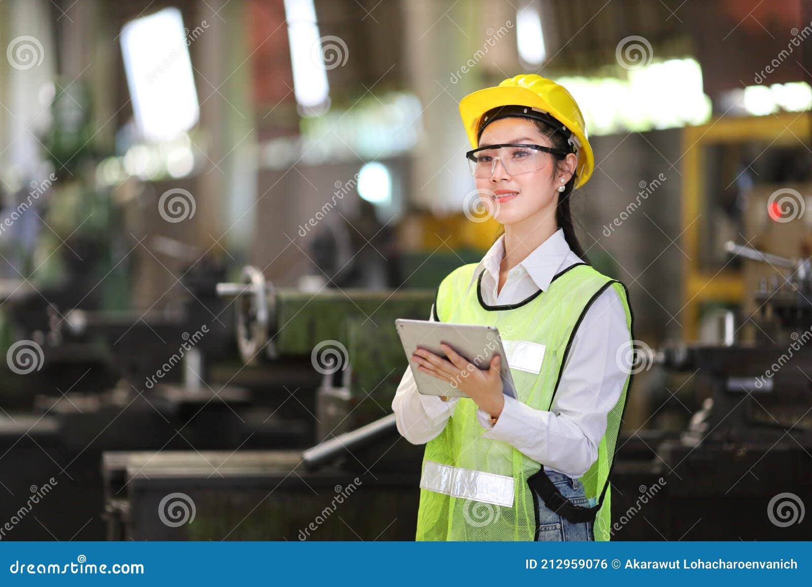 Asian Engineering Manager in Safety Hard Hat and Reflective Cloth is ...