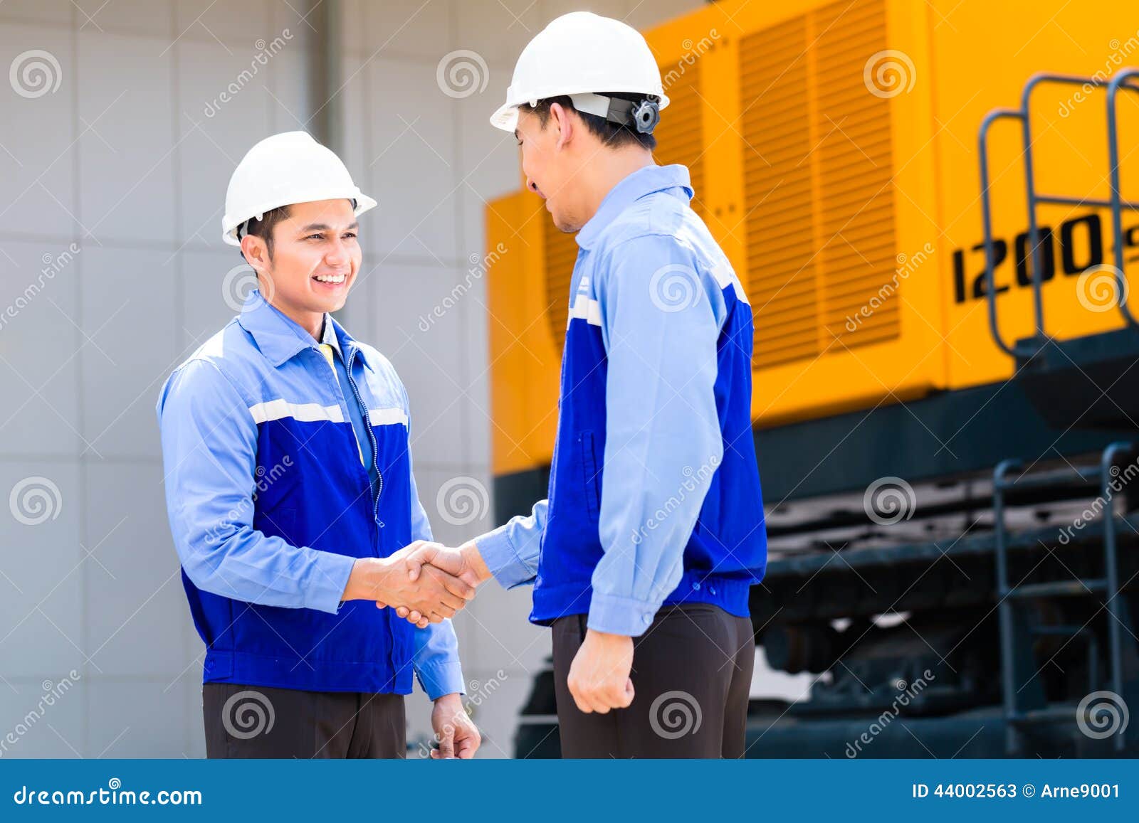 Asian Engineers Having Agreement on Construction Site Stock Image ...