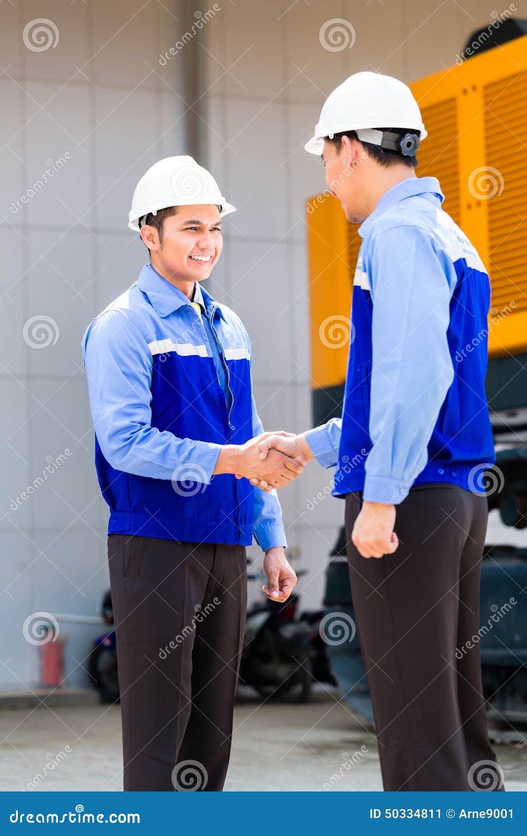 Asian Engineers Having Agreement on Construction Site Stock Image ...