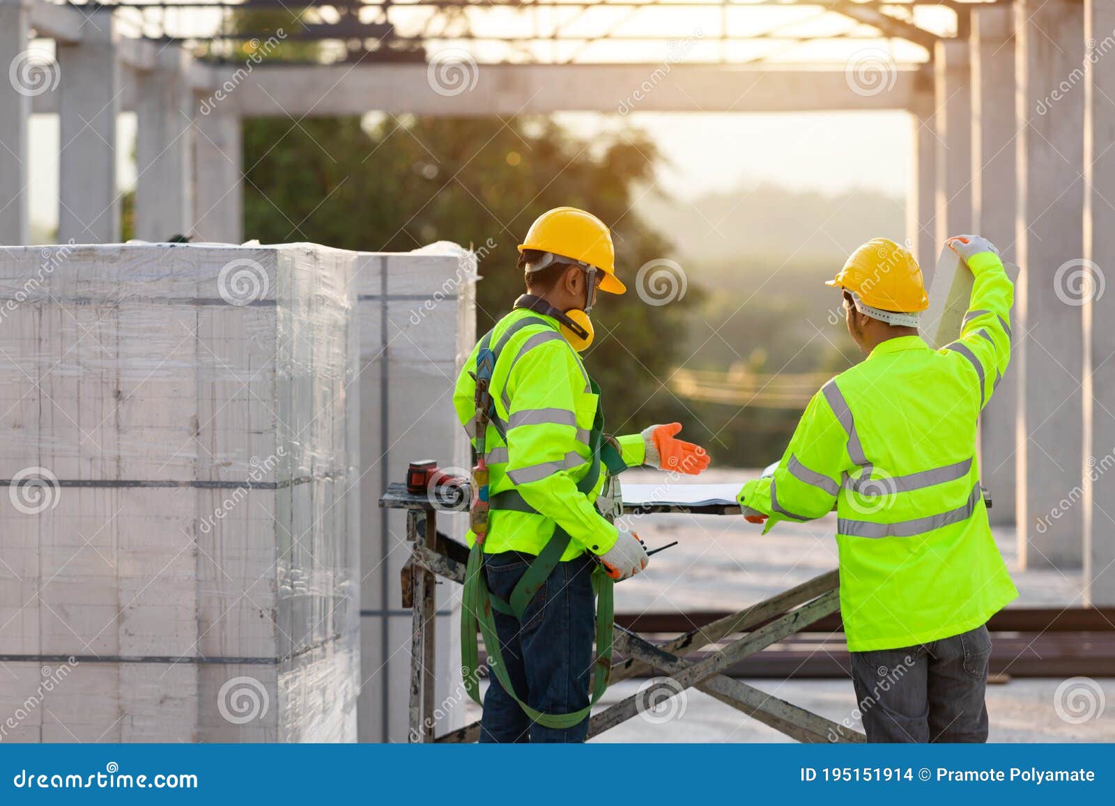 Asian Engineers and Workers Consulted Together for Construction ...