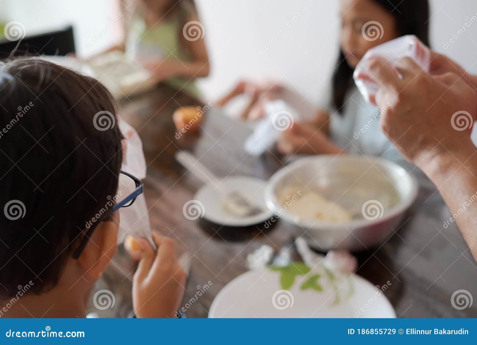 Asian Family Cake Decorating at Home Stock Image - Image of people ...