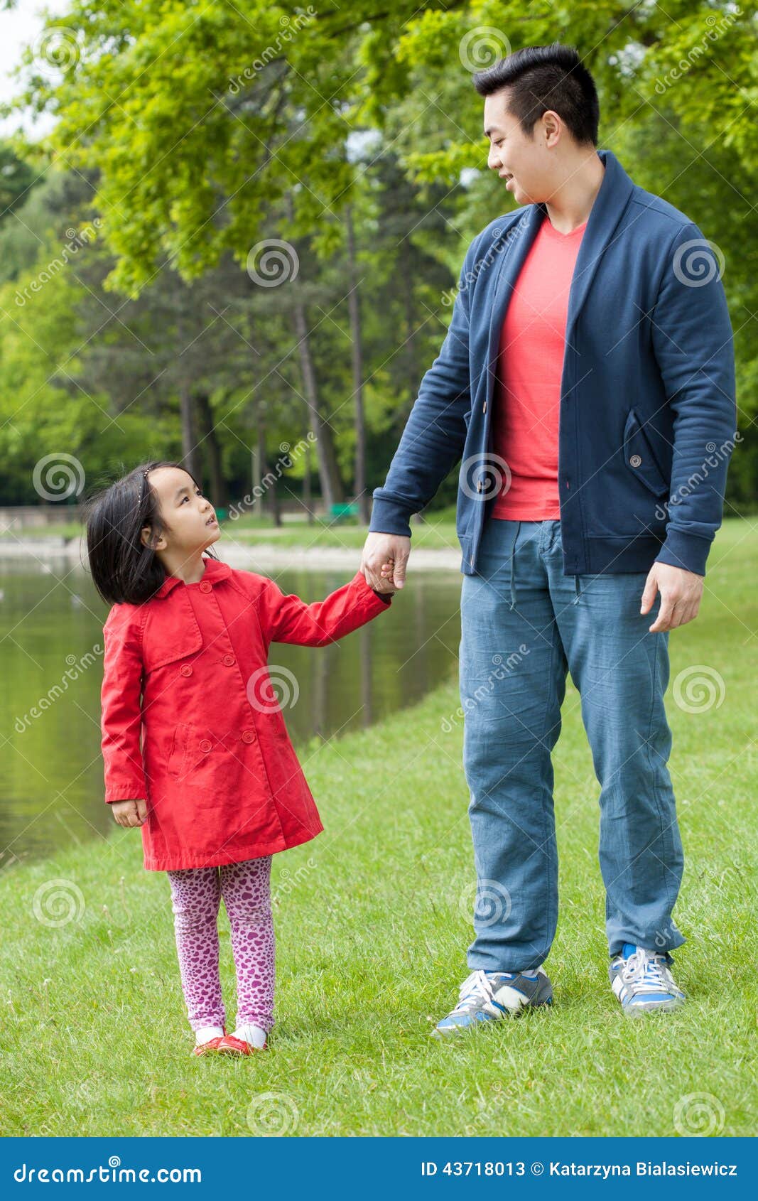 Asian Family Walking in a Park Stock Image - Image of laughing, play ...
