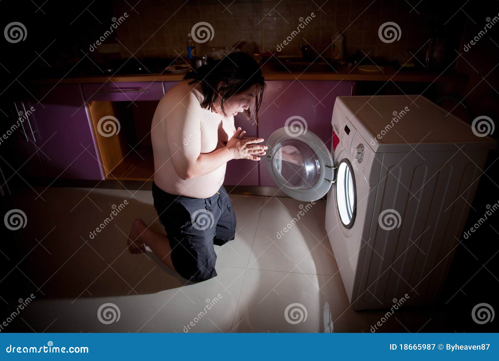 Asian Fat Man Kneel in Prayer by Washing Machine Stock Image - Image of ...