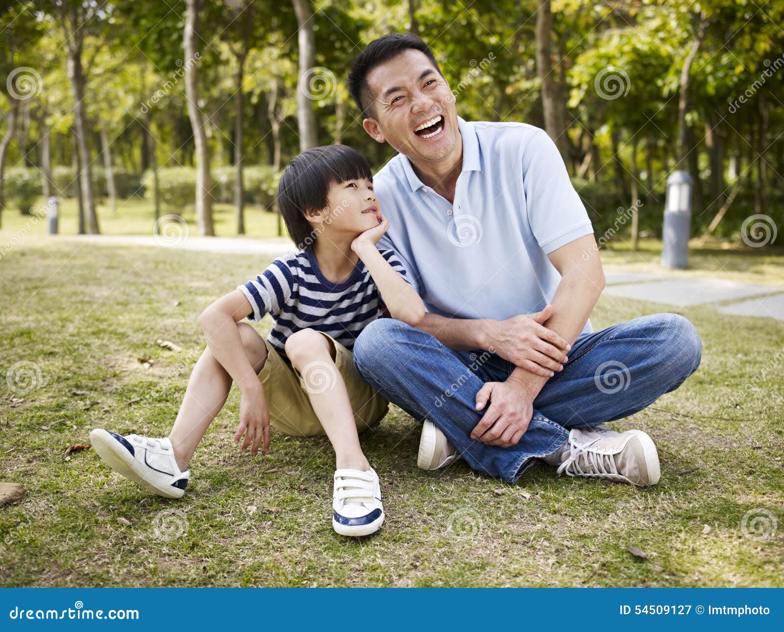 Asian Father and Son Having a Conversation Stock Image - Image of ...