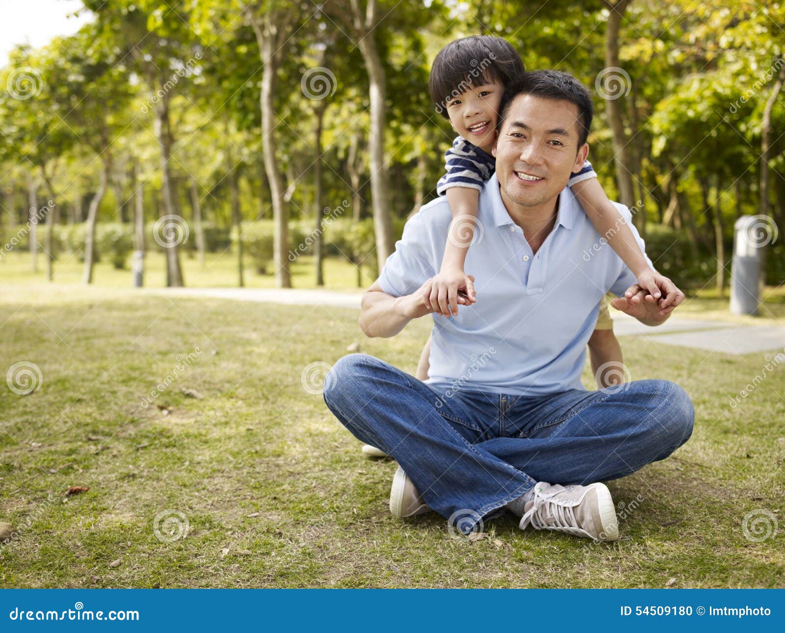 Asian Father And Son Having Fun In Park Stock Photography ...