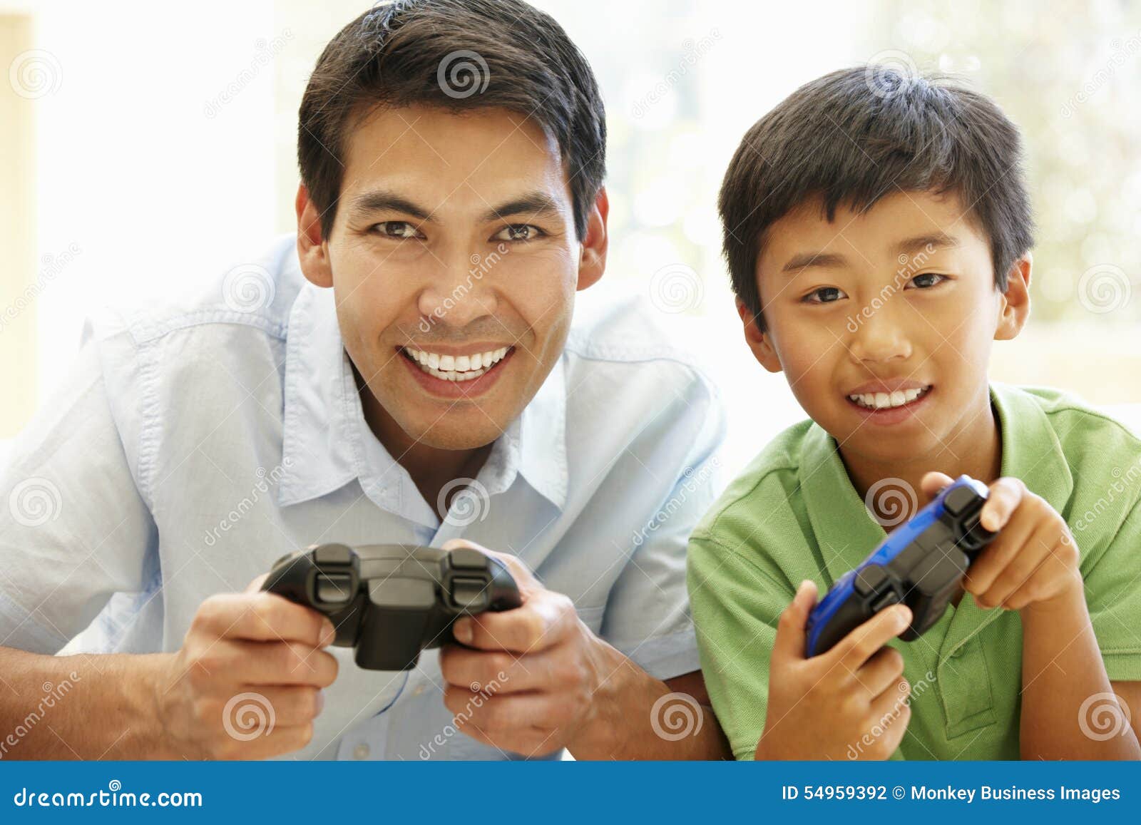 Asian Father and Son Playing Videogames Stock Photo - Image of male ...
