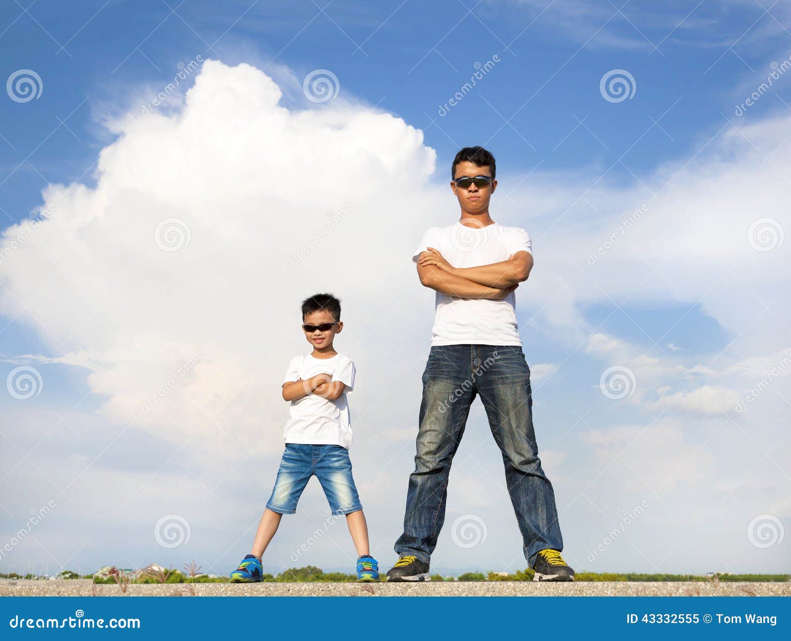 Asian Father and Son Standing on a Stone Platform Stock Image - Image ...