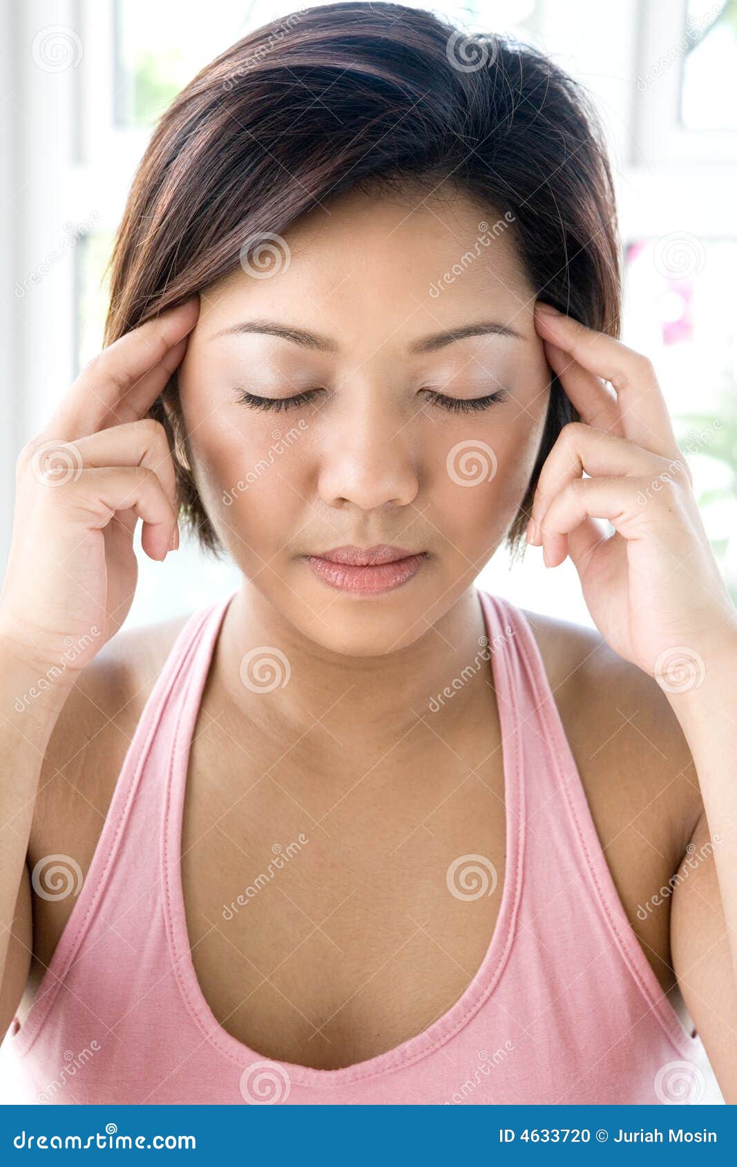 Asian Female Applying Gentle Pressure on Temple Stock Photo - Image of ...