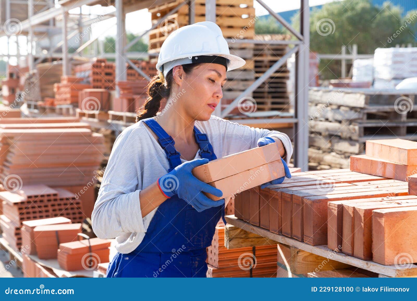 Asian Female Calculating Bricks before Selling Stock Photo - Image of ...