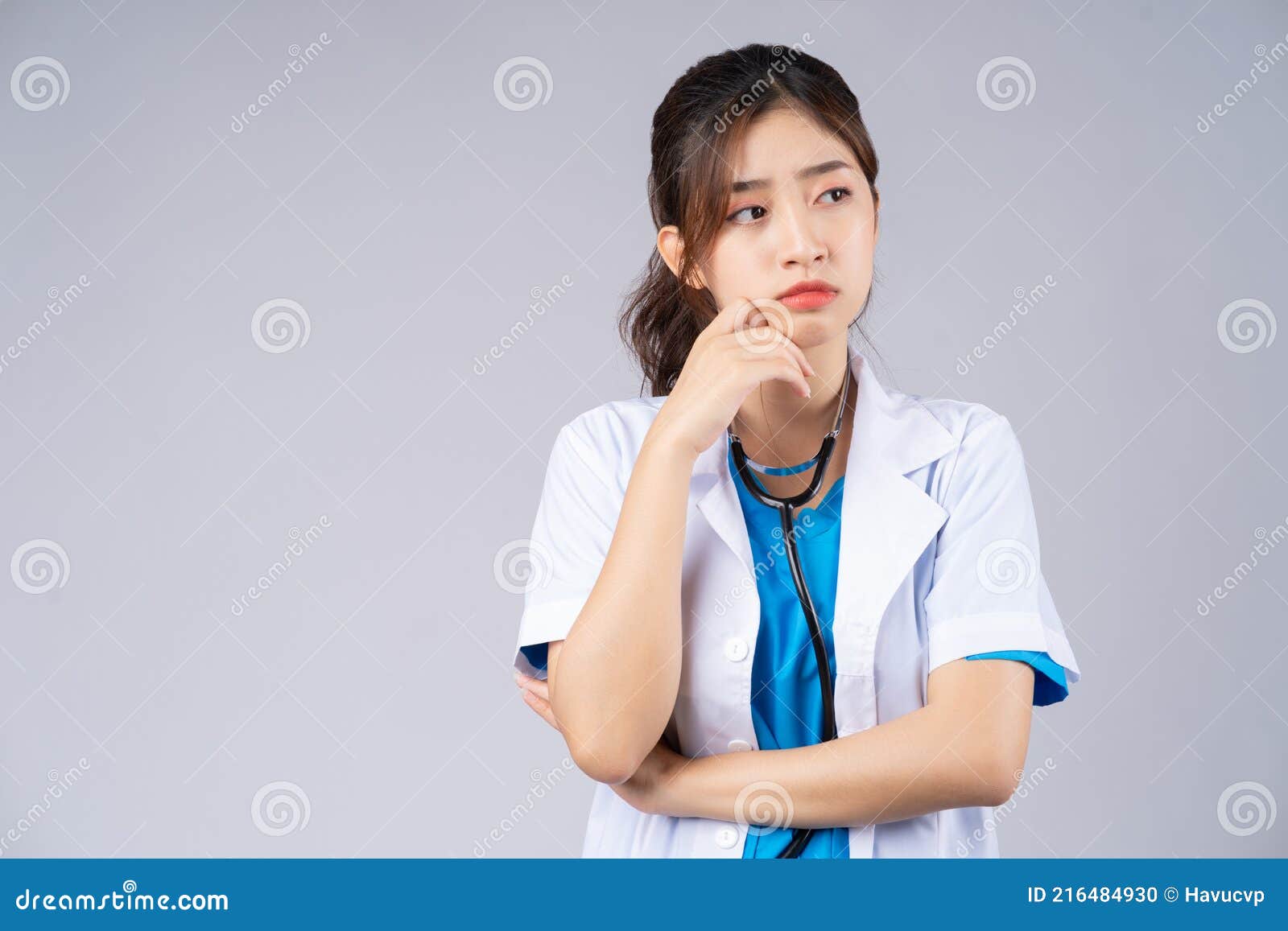 Asian Female Doctor is Pondering Stock Photo - Image of friendly, face ...
