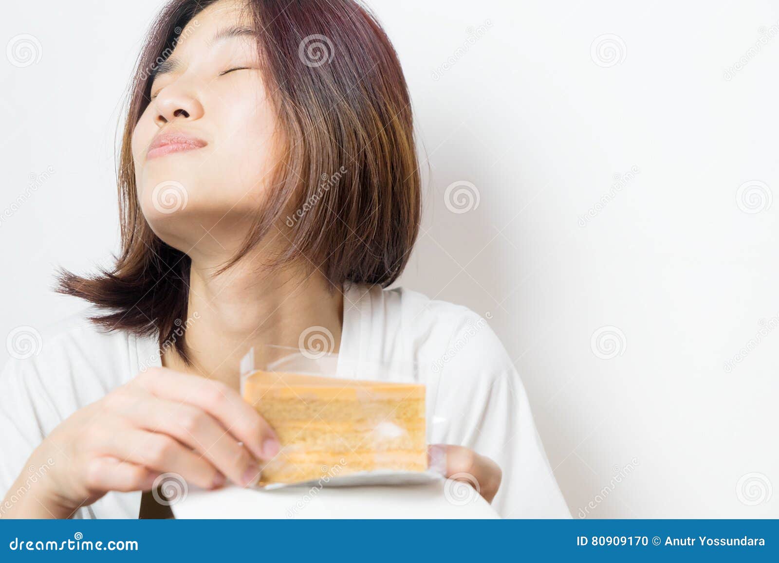 Asian Female Expression of the Cake is Smelling Good Stock Photo ...