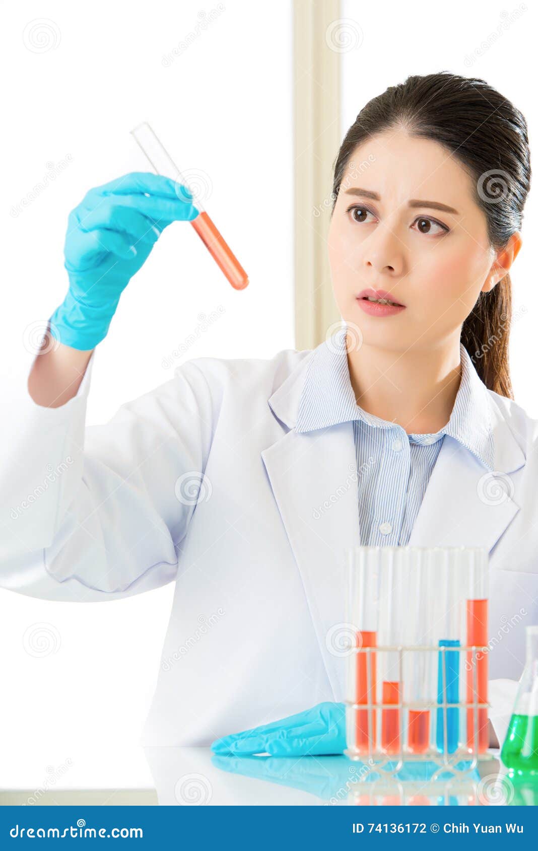 Forensic Pathologist. Doctor In Rubber Gloves Holding Human Skull Stock ...