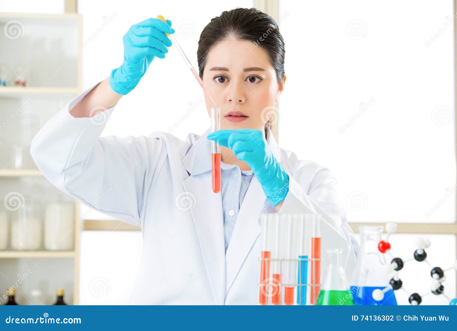 Asian Female Forensic Scientist Working on Chemicals Stock Photo ...