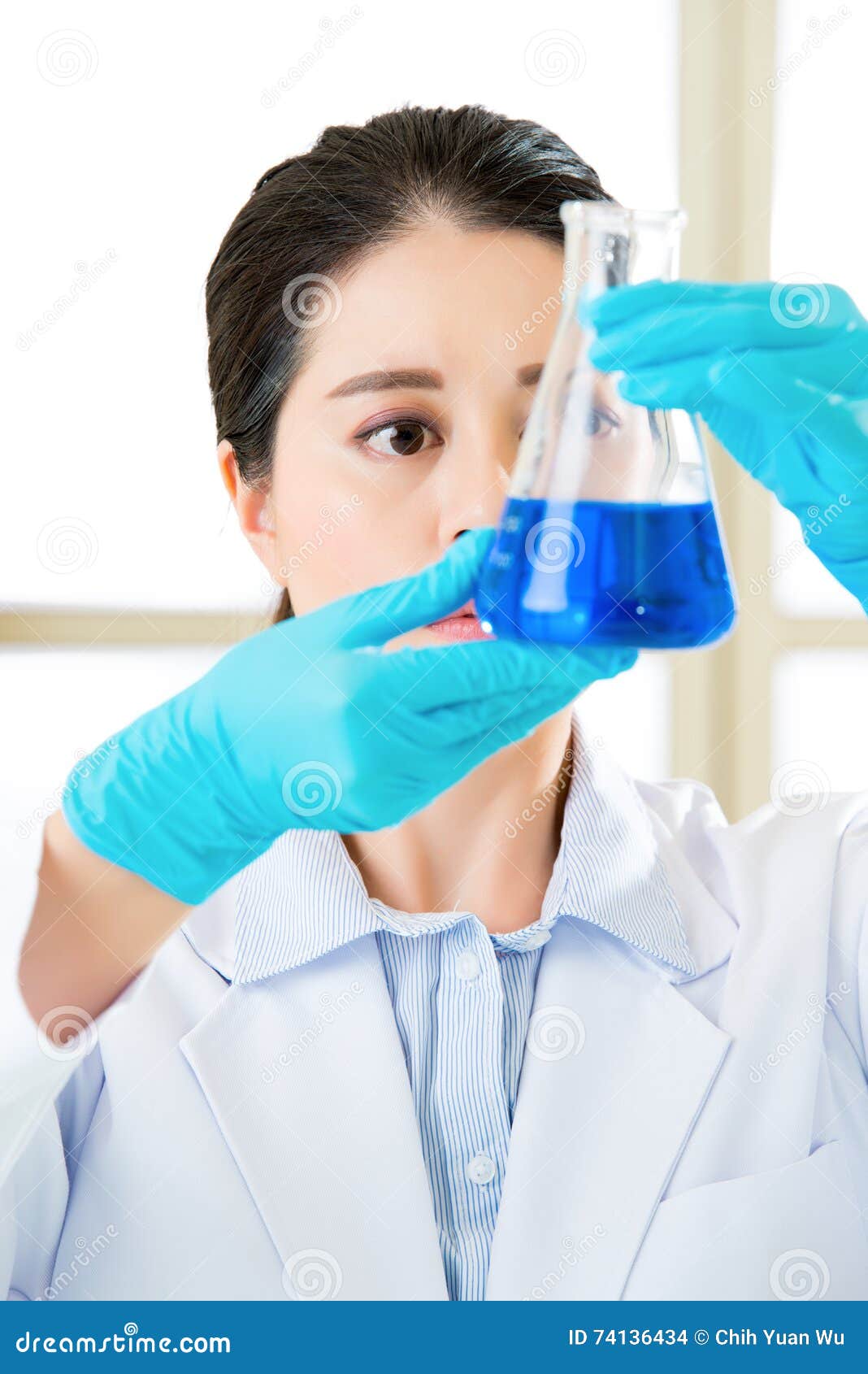 Forensic Pathologist. Doctor In Rubber Gloves Holding Human Skull Stock ...