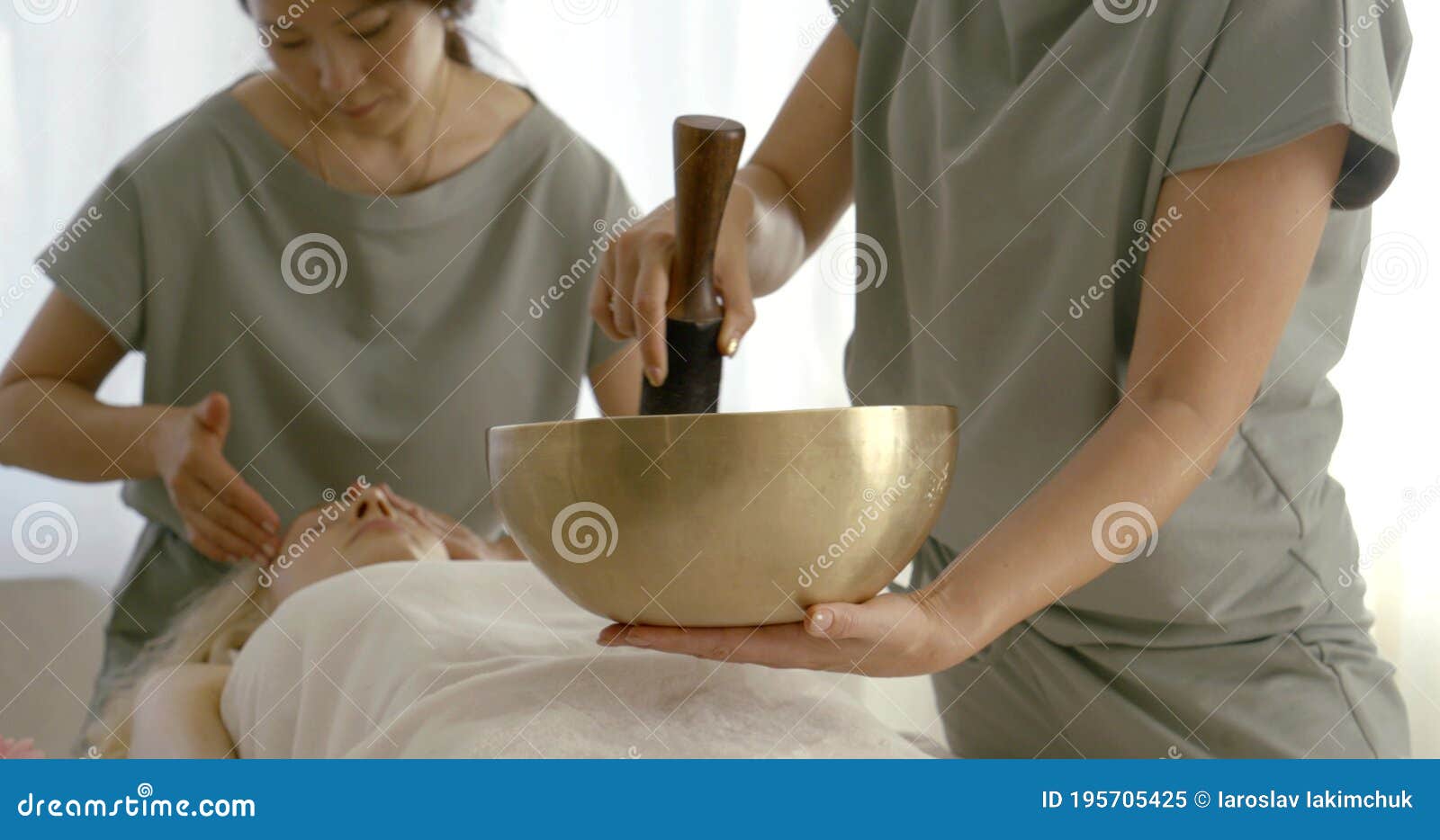 Asian Female Masters Are Massaging Face Of Client Woman And Making