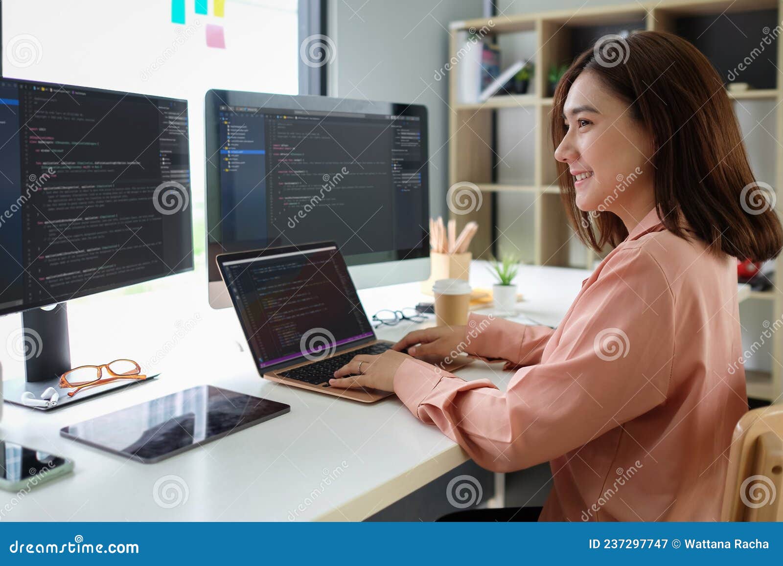 Asian Female Programmer Working at at Modern Office. Developing ... Asian Female Programmer Working at at Modern Office. Developing ...