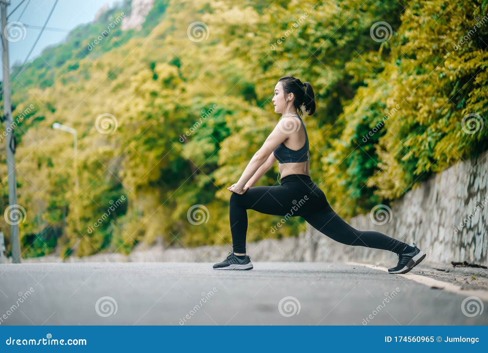 Asian Fitness Woman Runner Stretching Legs Before Run Stock Image