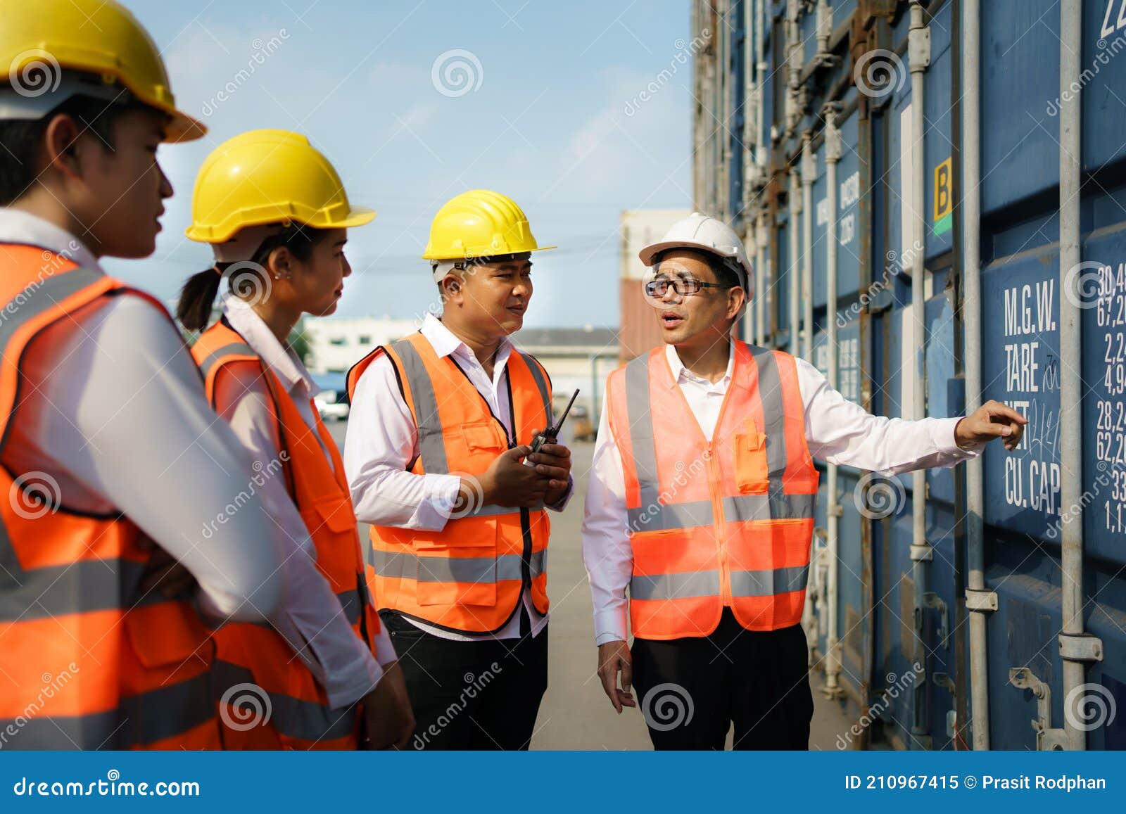 Asian Foreman is Explaining and Teaching New Training Workers for ...