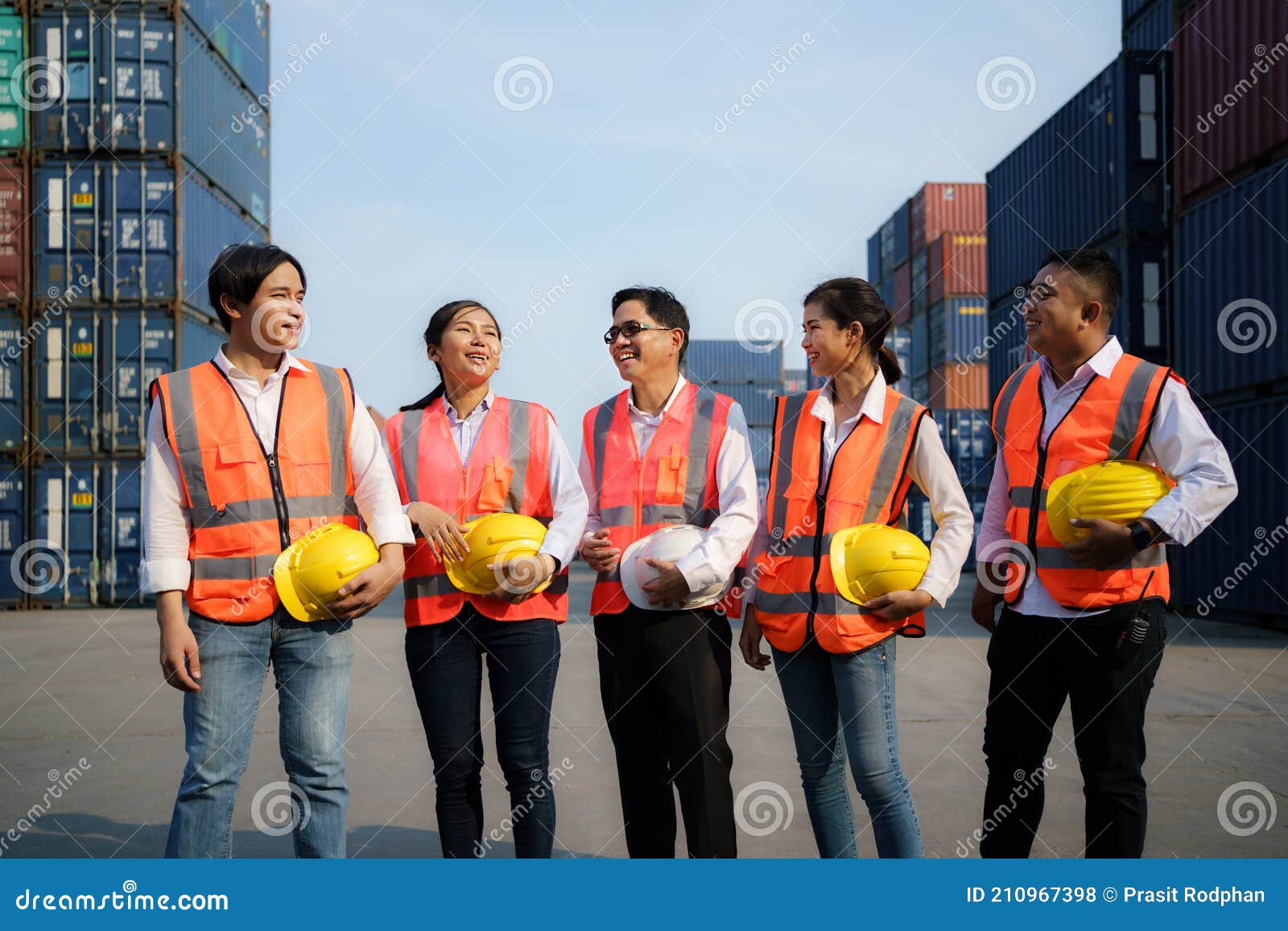 Asian Foreman and Staff Resting and Talking Together in the Container ...
