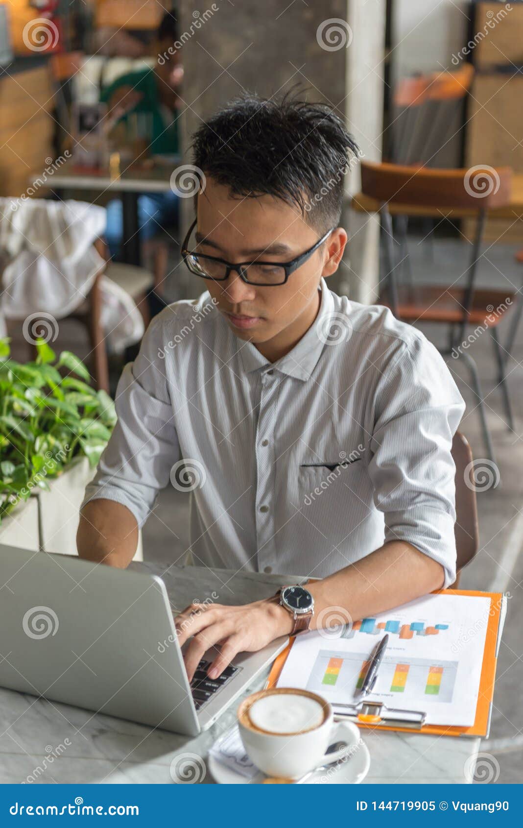 Asian Freelancer Working on Laptop in the Cafe Stock Image - Image of ...