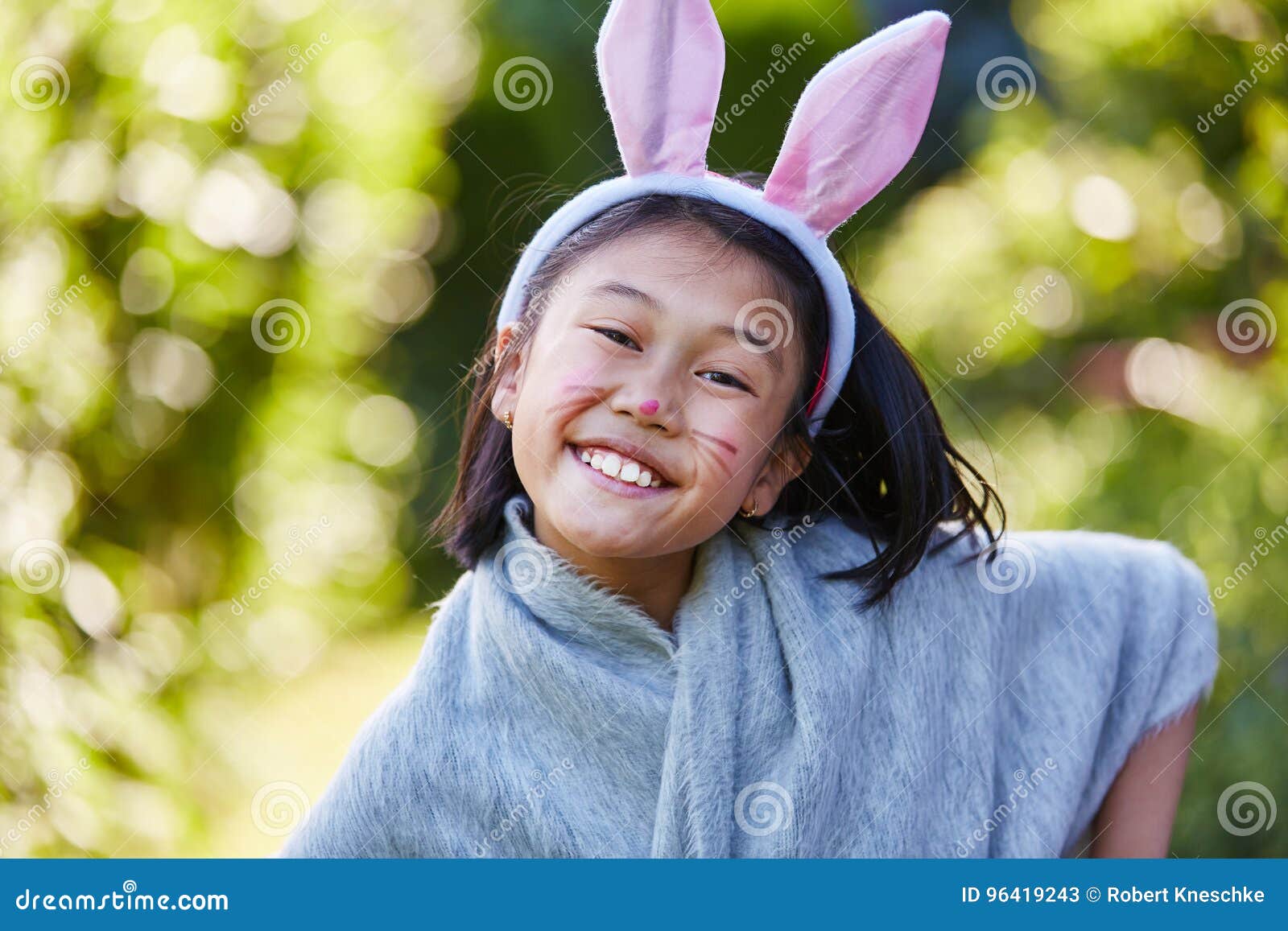 Asian girl with bunny ears stock image. Image of dress - 96419243