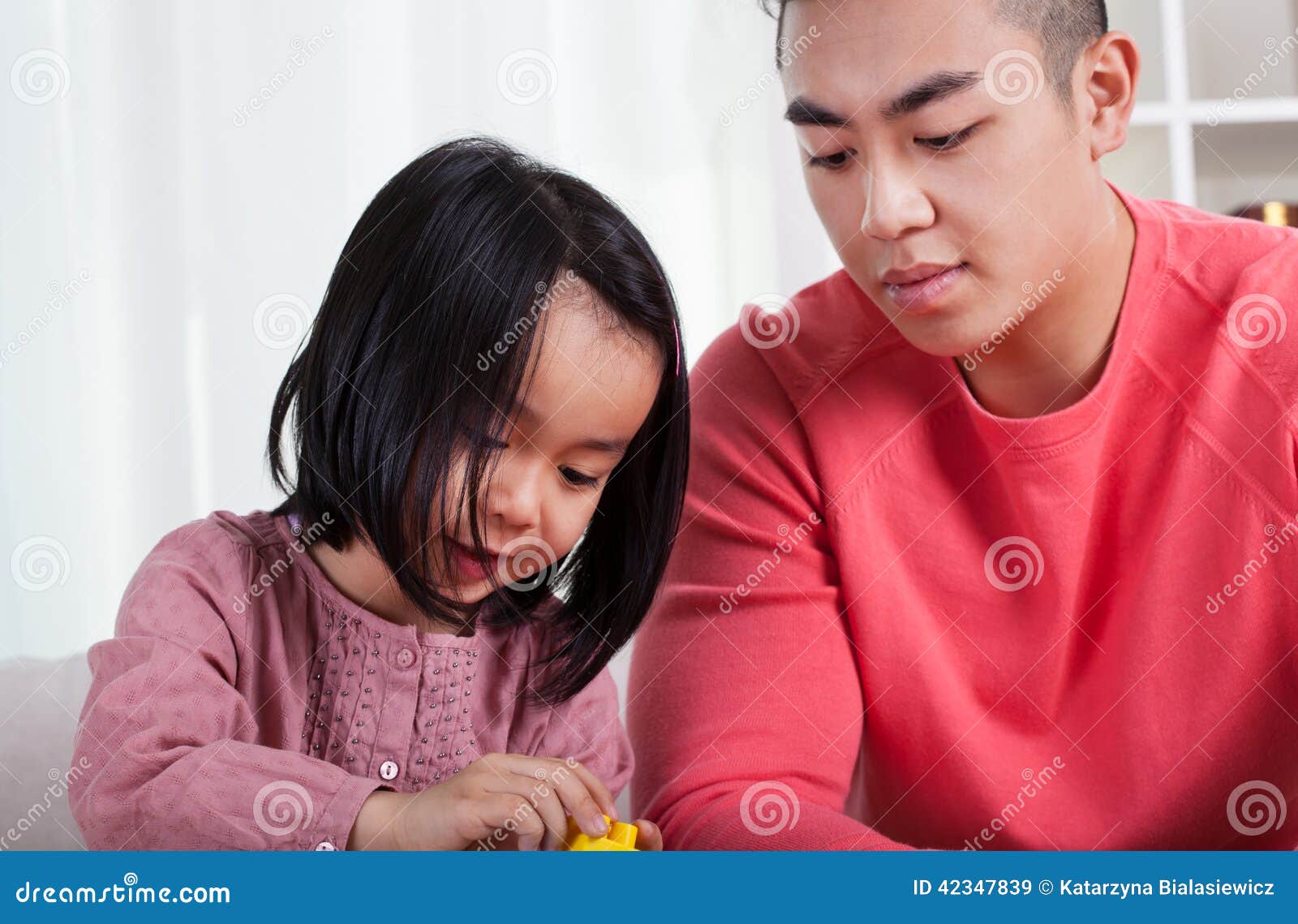 Asian girl and caring dad stock image. Image of resting - 42347839