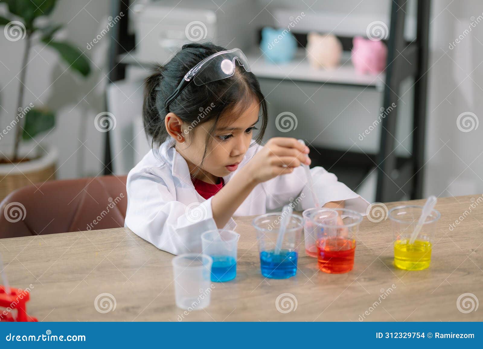 Asian Girl Doing Chemical Experiments at the Lab Stock Photo - Image of ...