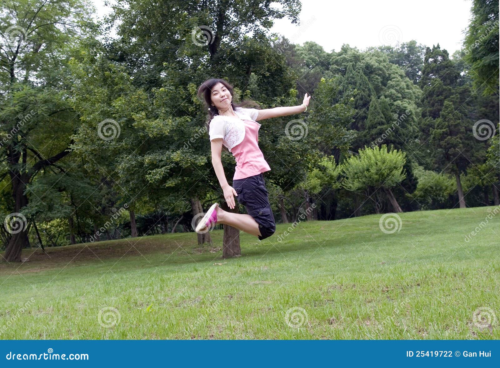 Asian girl jumps stock photo. Image of rose, girl, grass - 25419722