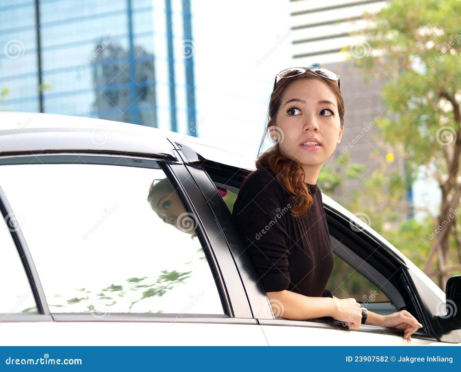 Asian Girl Looking at Back of Car Stock Photo - Image of people ...