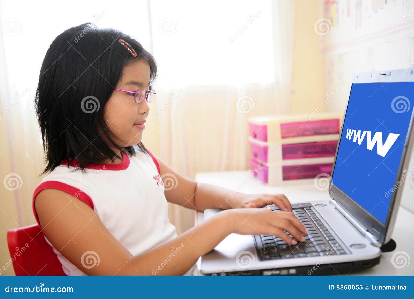 Asian Girl Playing with Laptop Computer on Table Stock Image - Image of ...