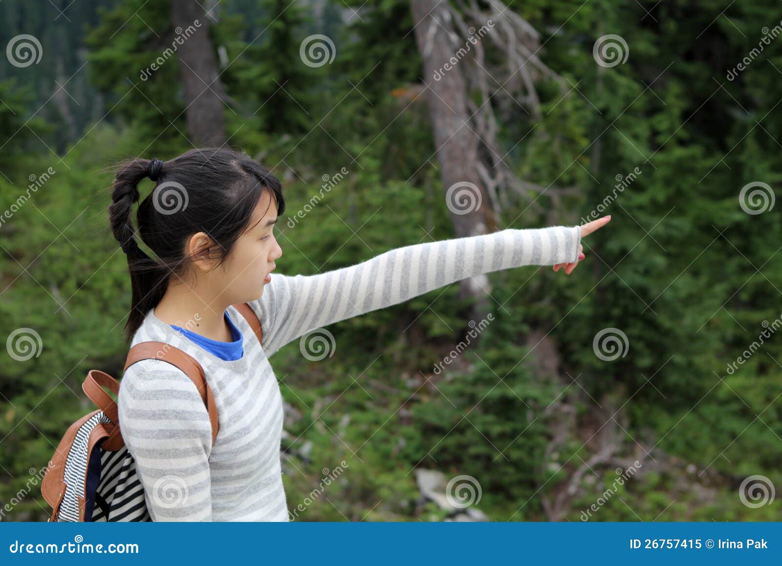 Asian girl pointing out stock image. Image of nature - 26757415