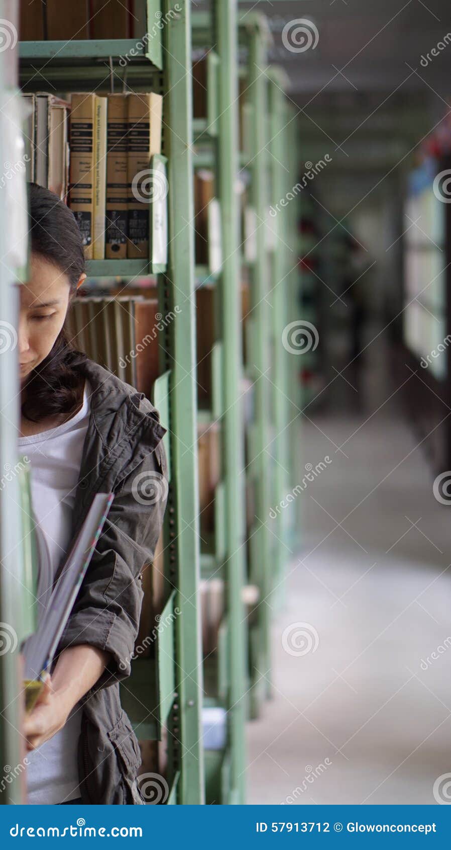 Asian Girl reading book stock photo. Image of bookshelves - 57913712