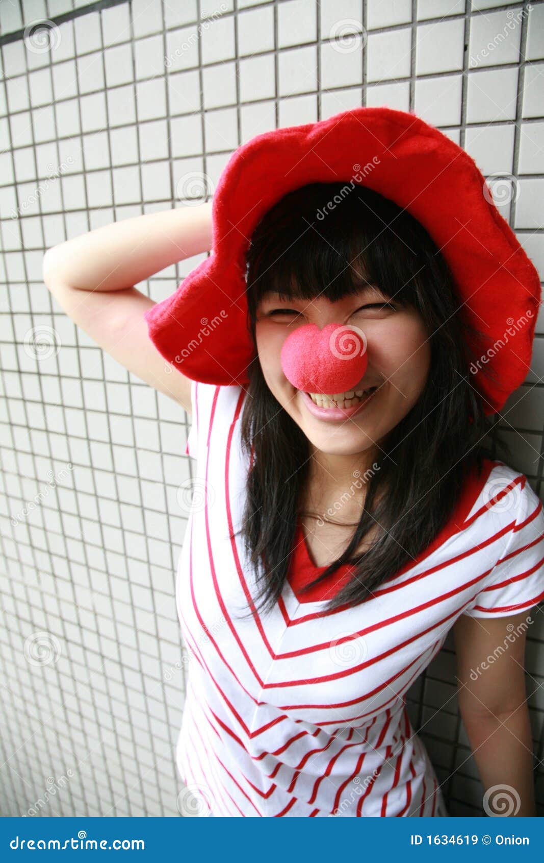 Asian Girl with Red Nose and Hat Stock Image - Image of female, smiles ...