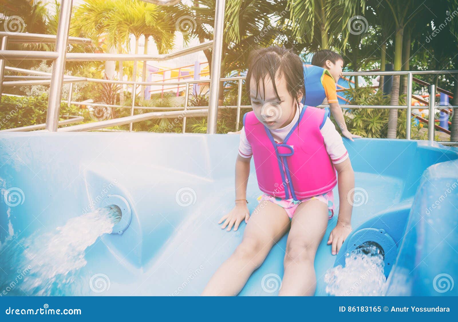 Asian Girl is Sliding Down the Sldie Stock Image - Image of swim, fast ...