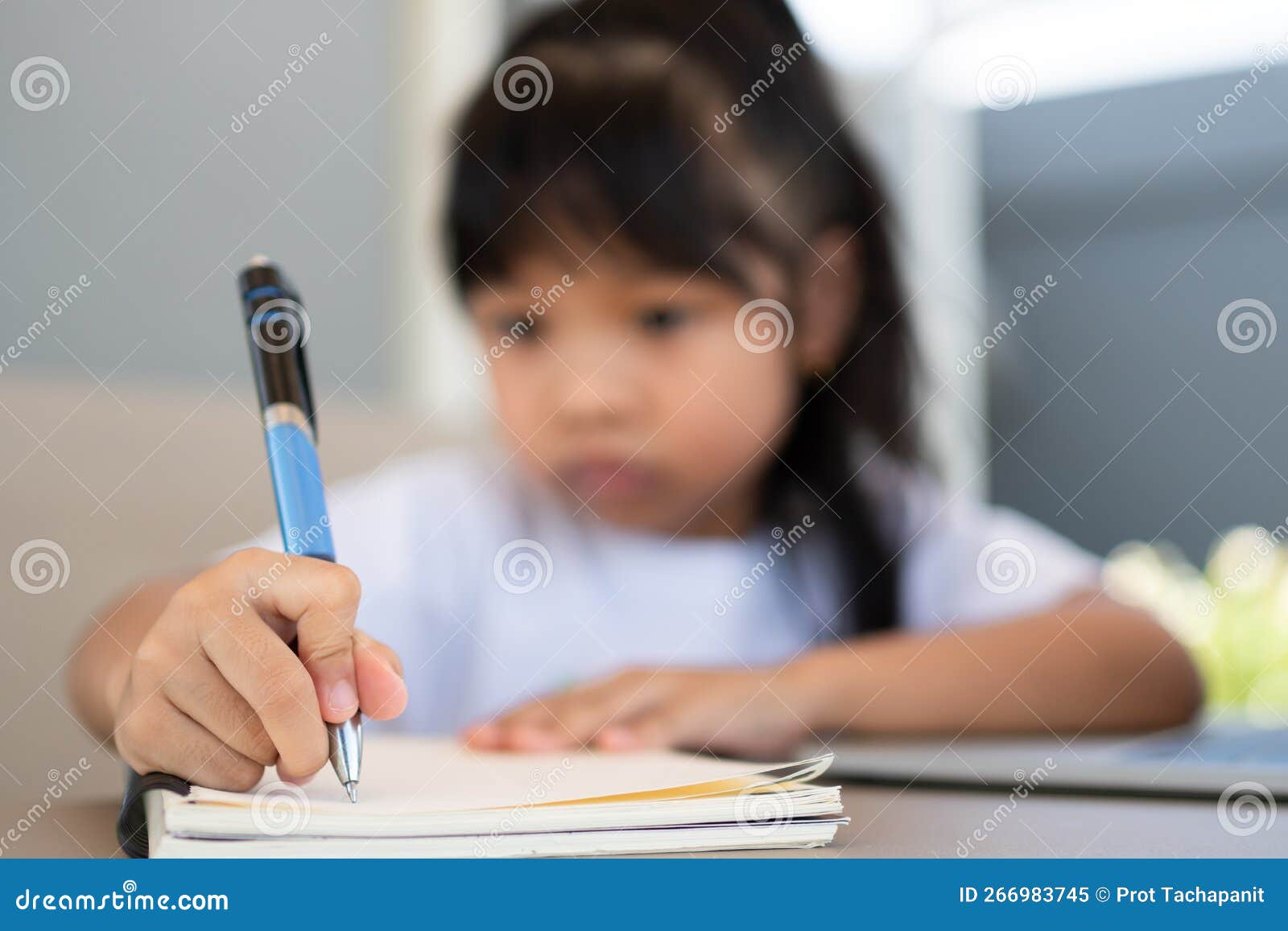 Asian Girl Student Holding a Pen for Taking Notes and Doing Homework ...