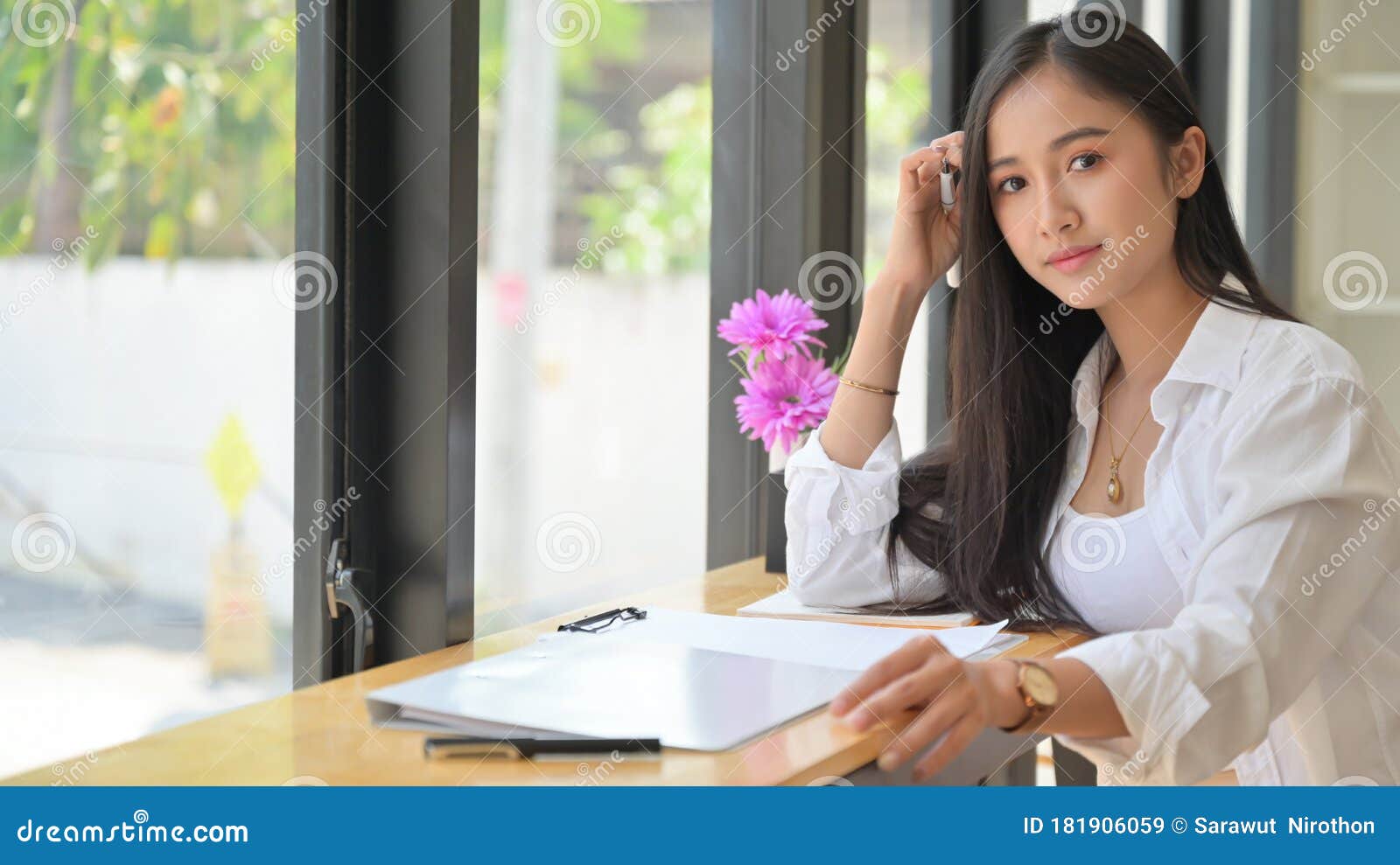Asian Girl Student with Study Materials in a Shared Workspace,she ...