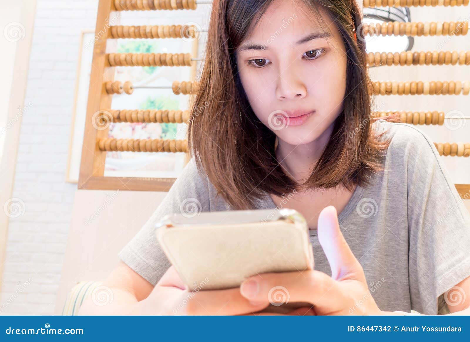Asian Girl is Texting Someone on Her Phone Stock Photo - Image of smart ...