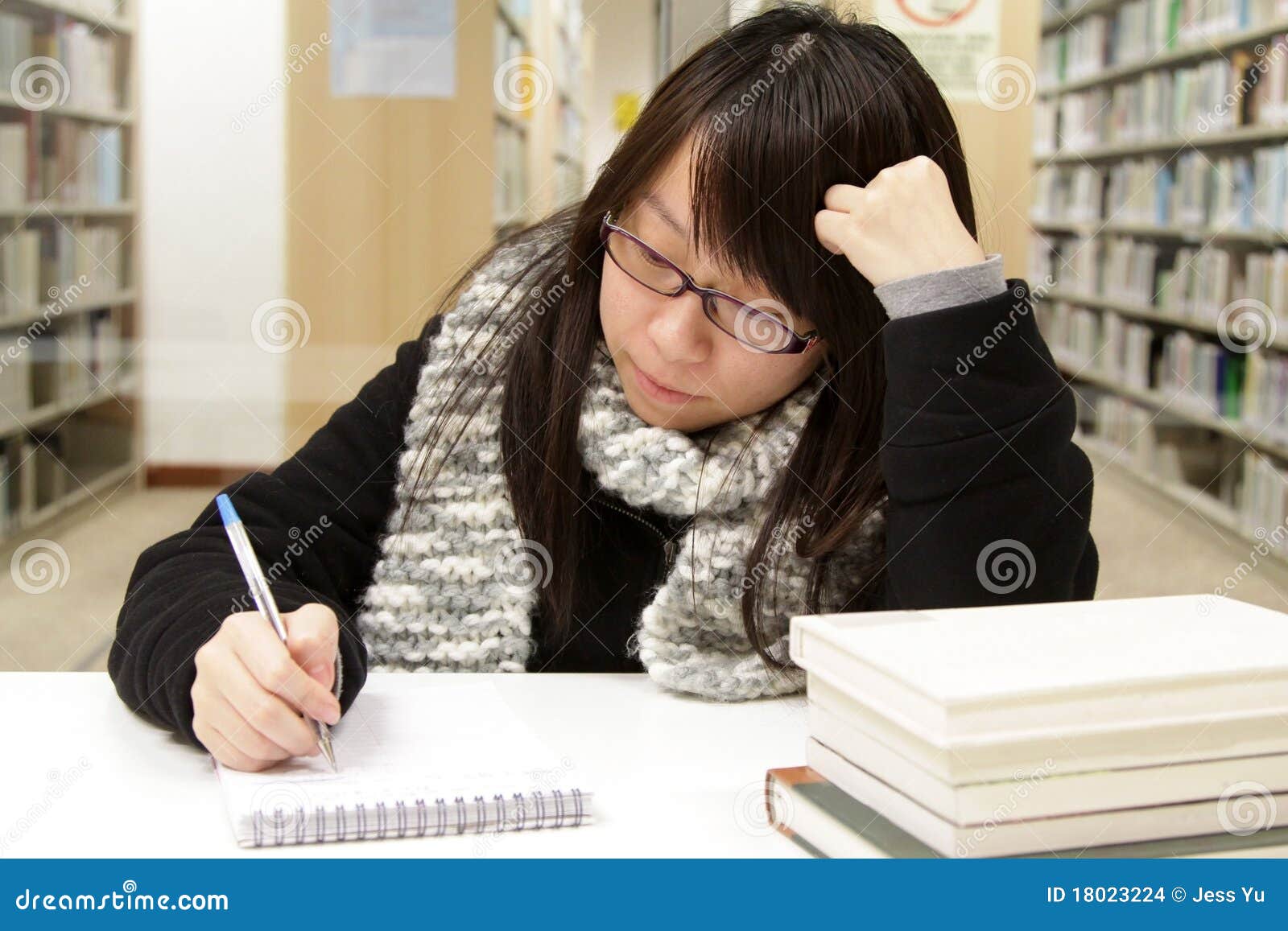 An Asian Girl Who is Reading and Studying Stock Photo - Image of ...