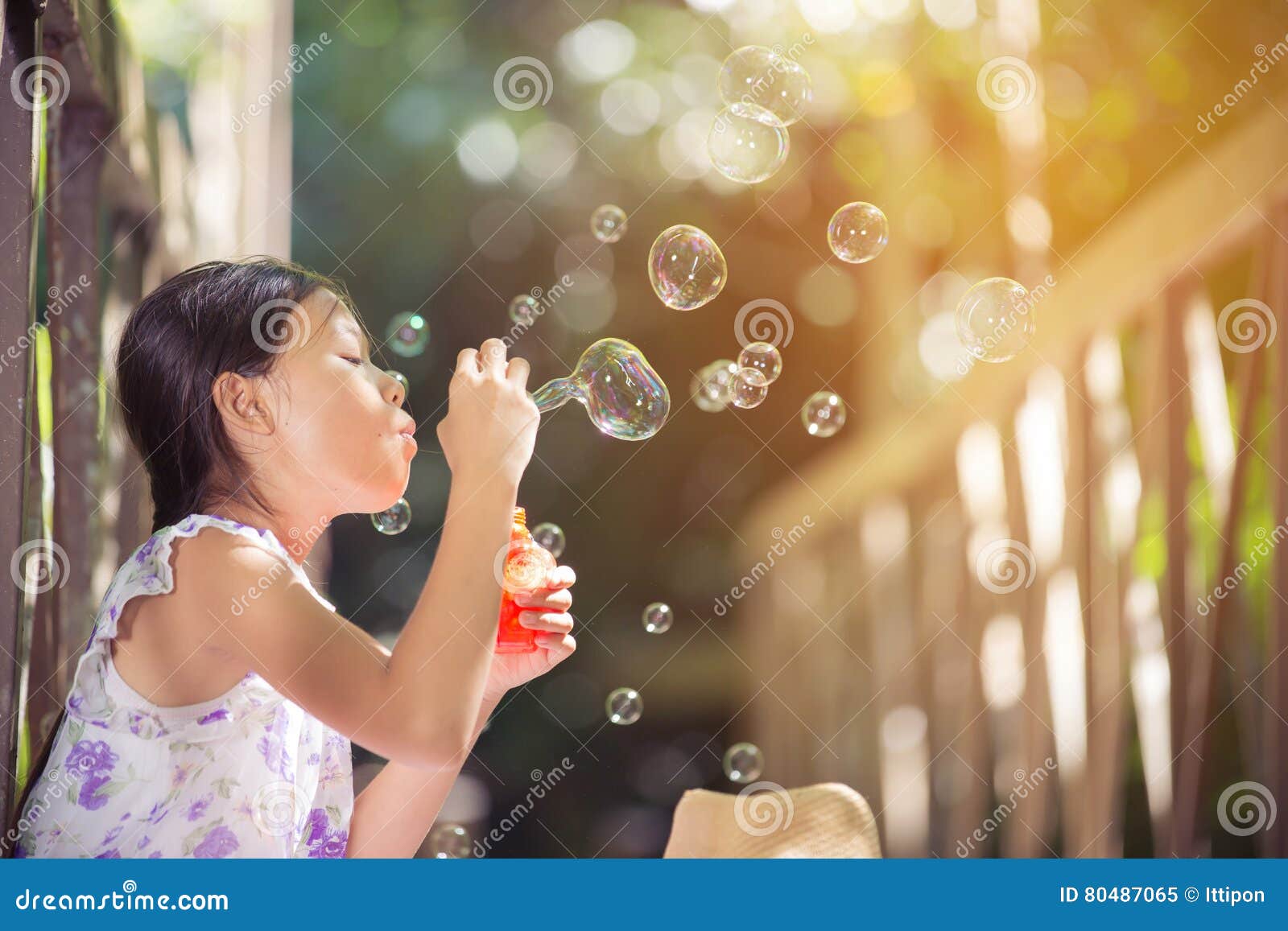 Asian Girls Play Blowing Bubbles on a Bridge Stock Image - Image of ...