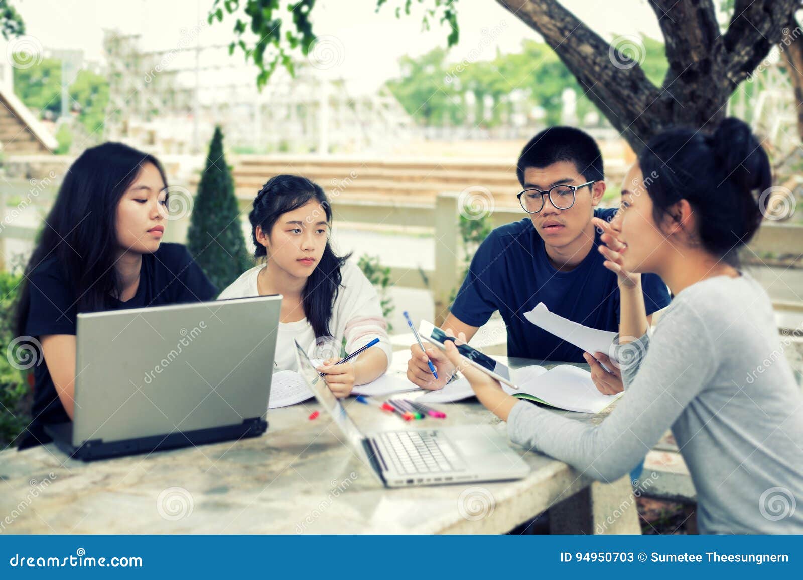 Asian Group of Students Sharing with the Ideas for Working on Th Stock ...