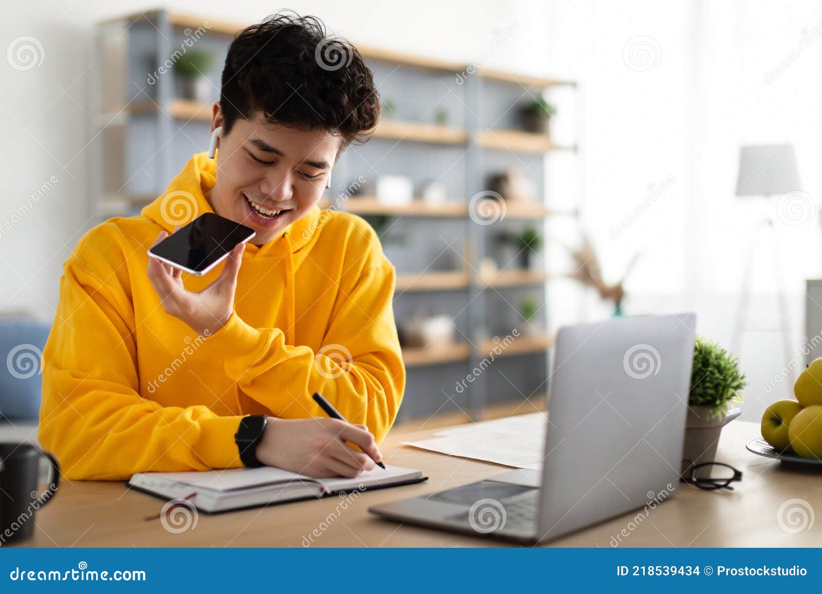 Asian Guy Using Voice Assistant on Cellphone Stock Photo - Image of ...