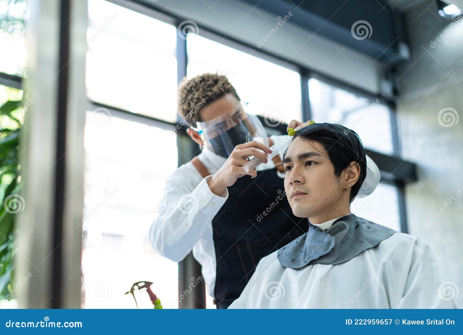 Asian Hairdresser Barber Wear Mask Cut Hair Of Attractive Man In Shop