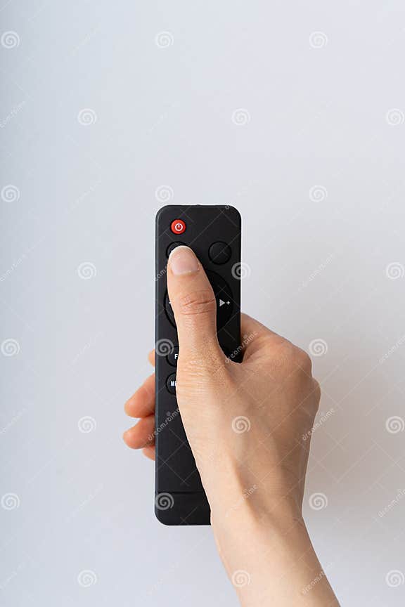 Operating the Remote Control Stock Photo - Image of connection ...